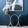 Modern Silver Chrome Metal Sweeping Arcs And Clear Glass Console Table ...